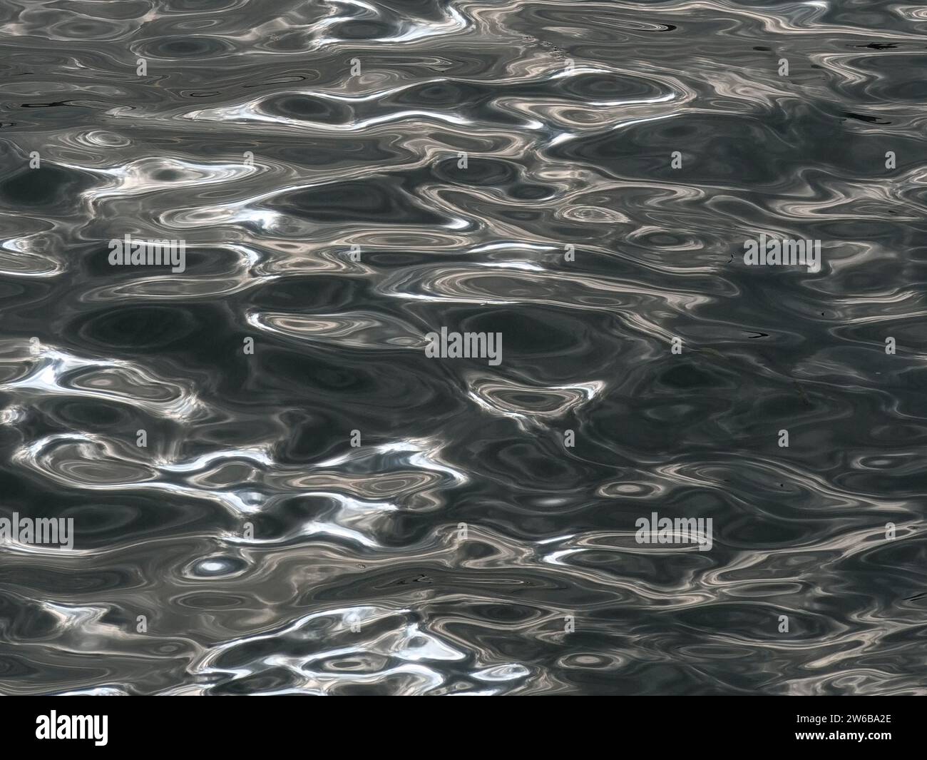 Silvery shimmering water texture in the Venice lagoon. Shimmering water ...