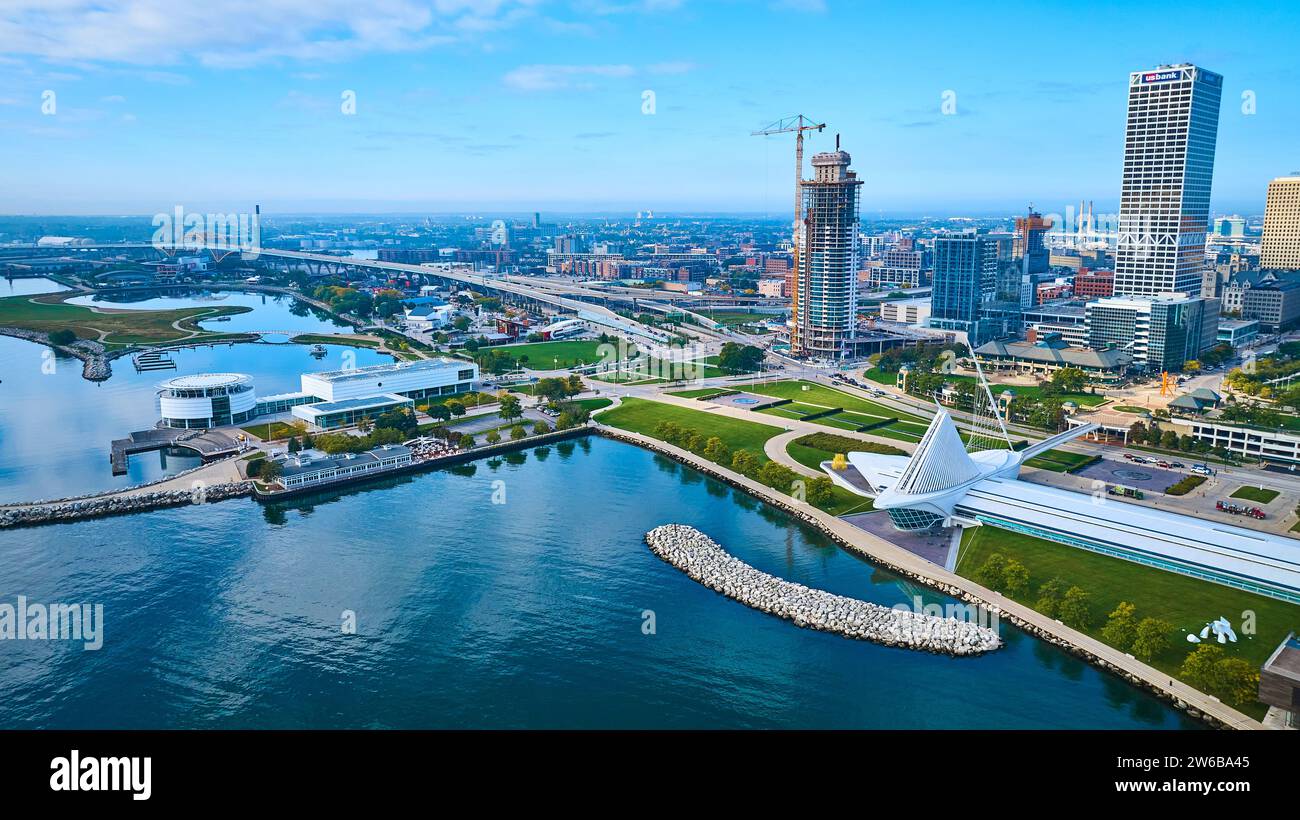 Aerial View of Urban Waterfront, Suspension Bridge, and Skyscraper ...