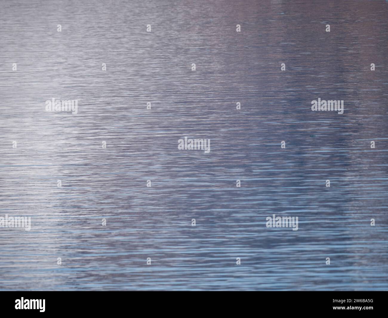 Water surface with iceberg reflections in a fjord in Greenland Stock ...
