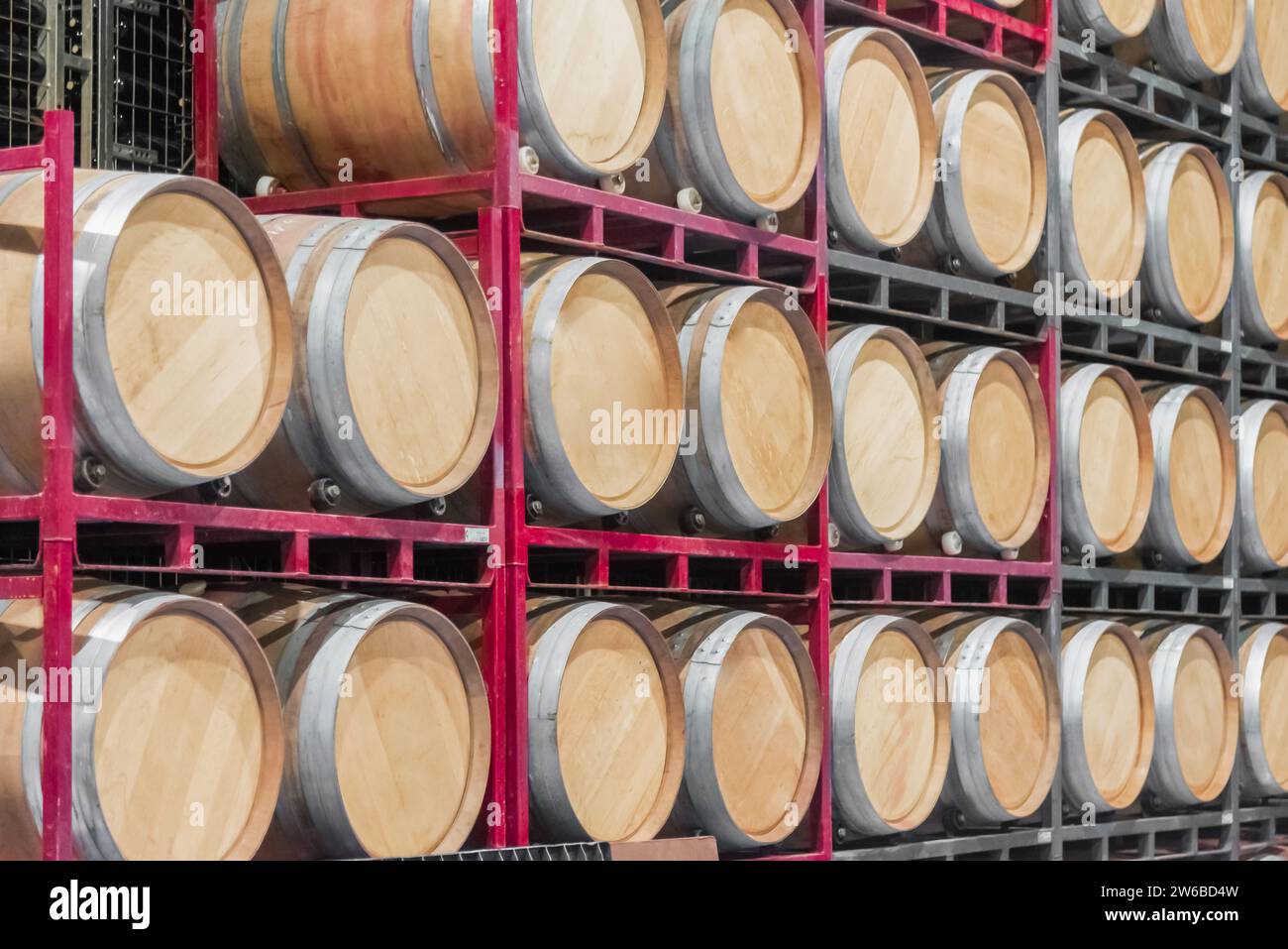 Big round wine cellar for storage of alcoholic beverages placed inside ...