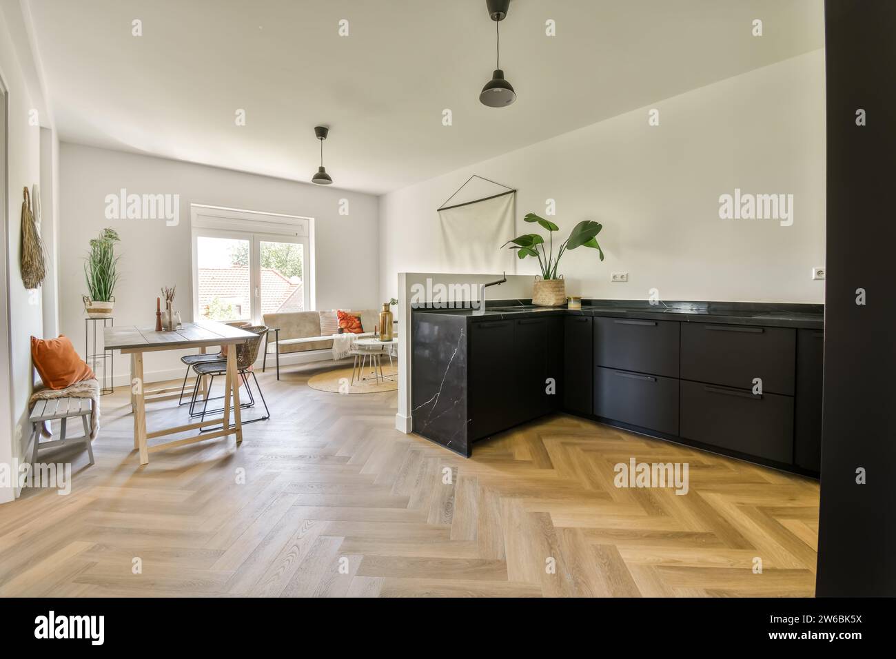 Spacious open plan contemporary house with kitchen counter and dining ...