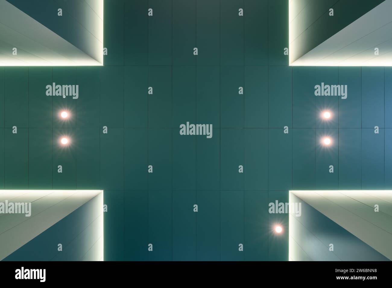 Directly below image of recessed lights on ceiling with columns on ...