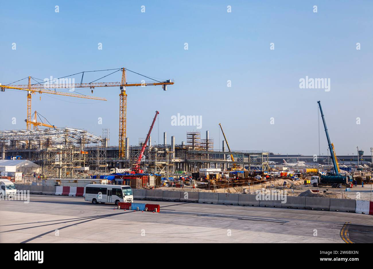 New construction works being carried out and yellow Liebherr tower ...