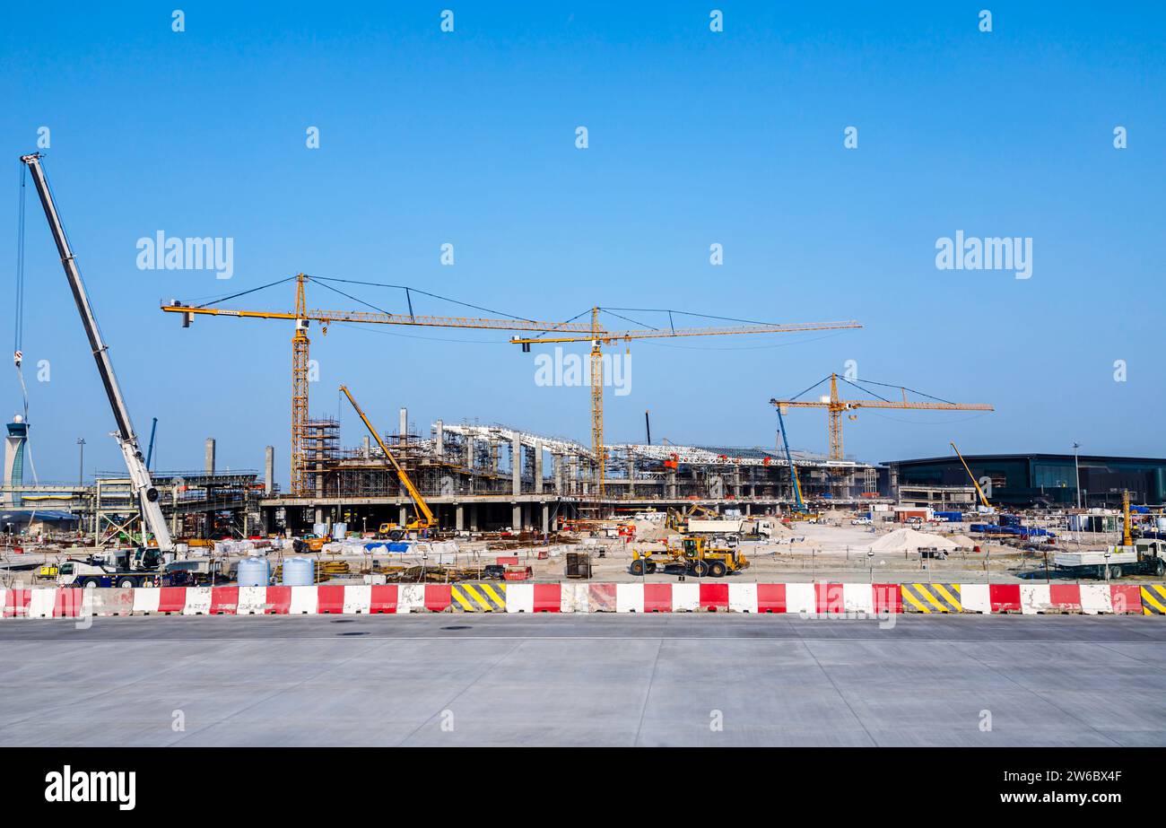 New construction works being carried out and yellow Liebherr tower ...