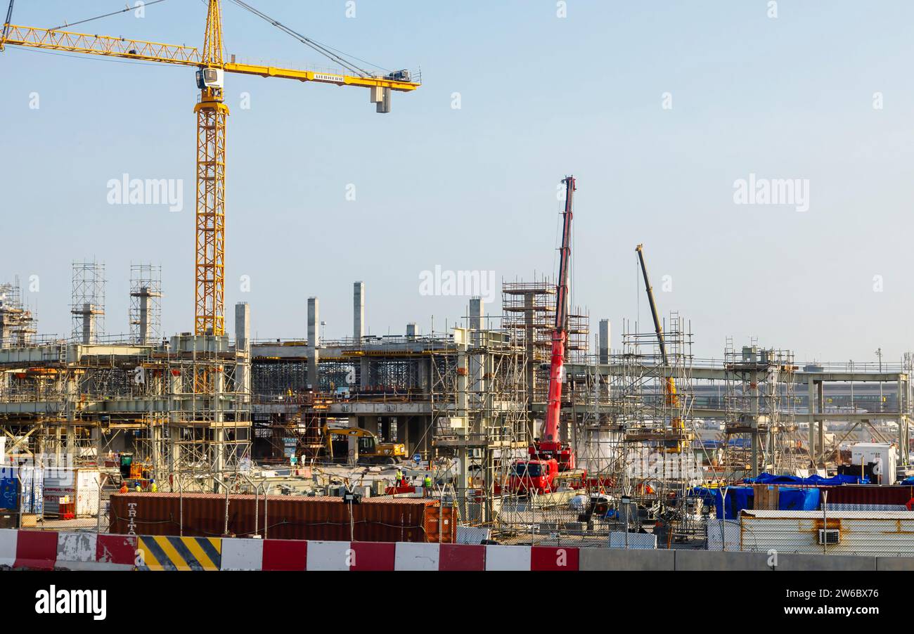 New construction works being carried out and yellow Liebherr tower ...