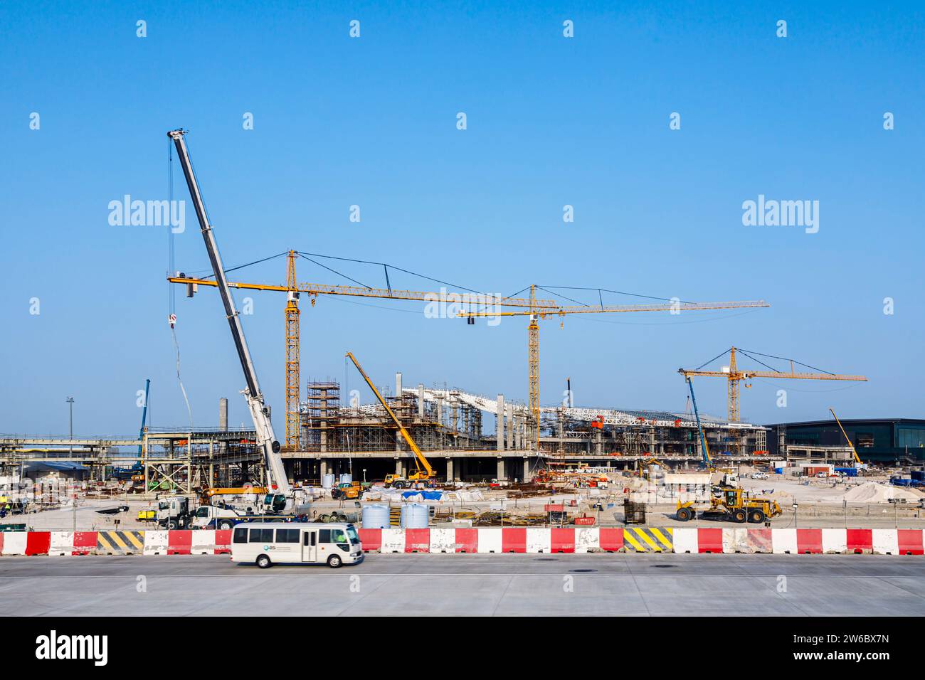 New construction works being carried out and yellow Liebherr tower ...