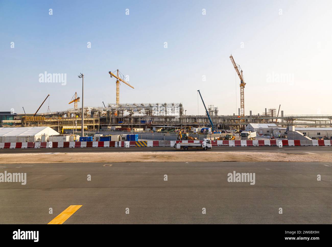 New construction works being carried out and yellow Liebherr tower ...