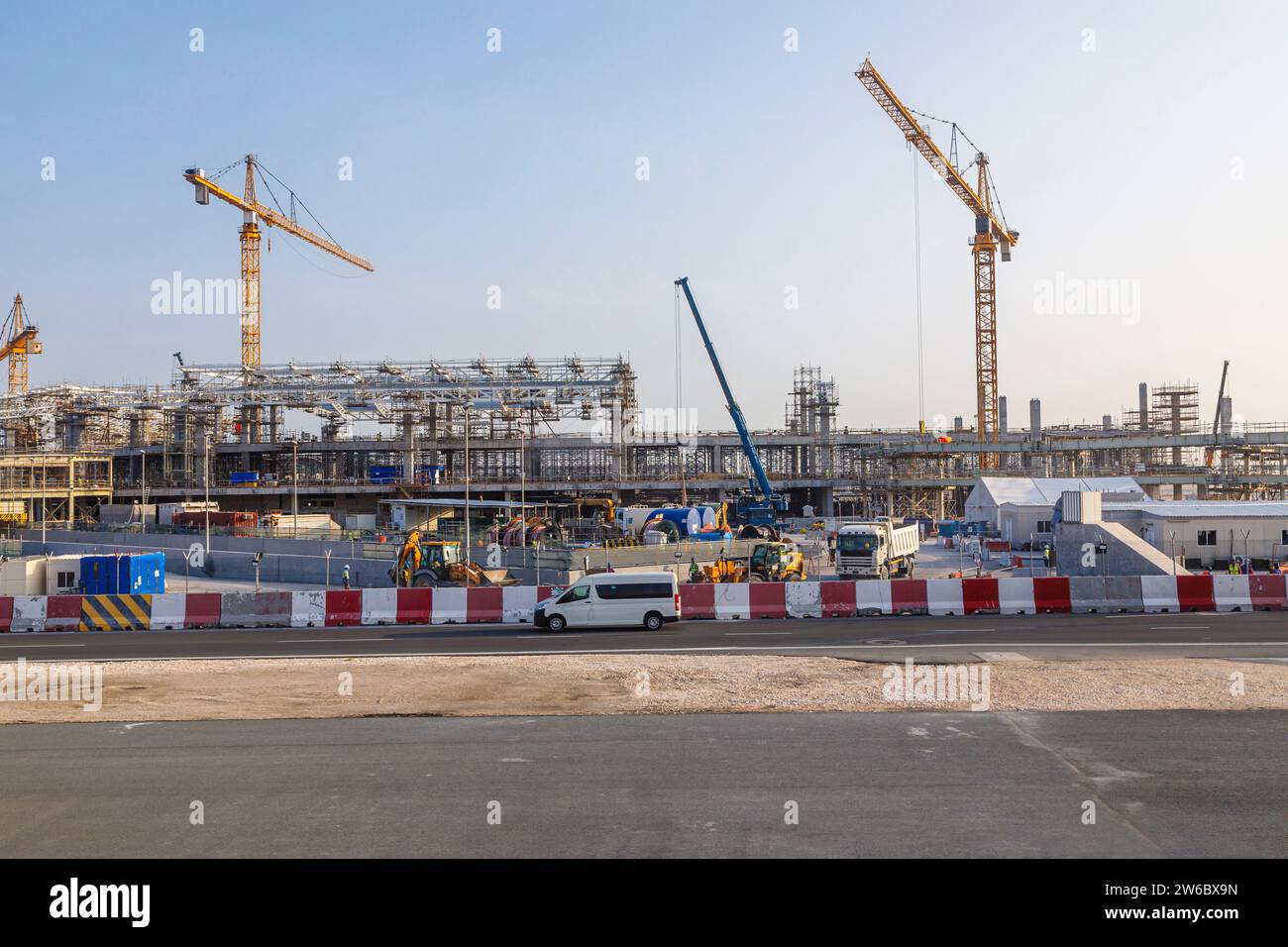 New construction works being carried out and yellow Liebherr tower ...