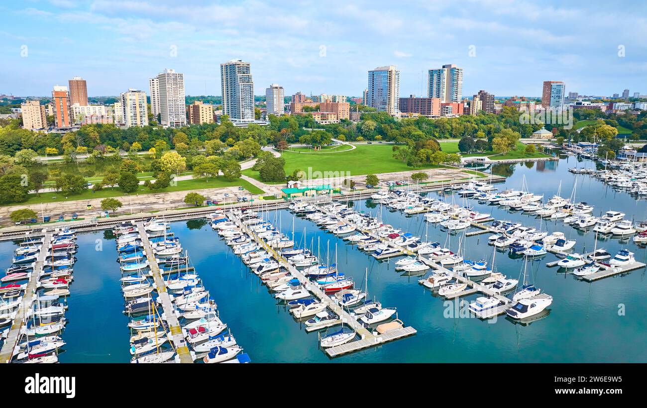 Aerial View of Marina with Sailboats and Urban Park Against City ...