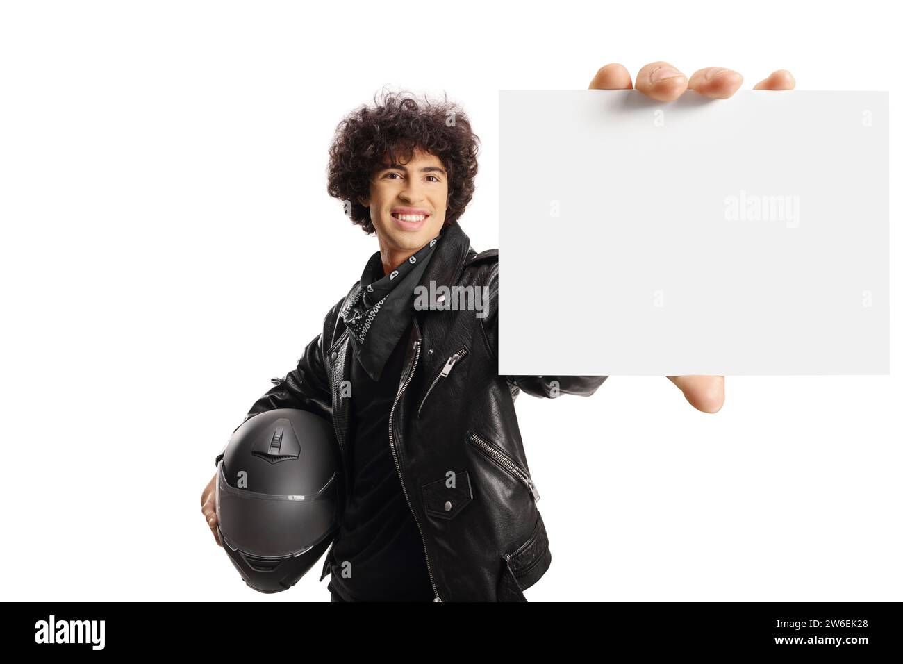 Biker in a black leather jacket holding a blank cardboard isolated on ...