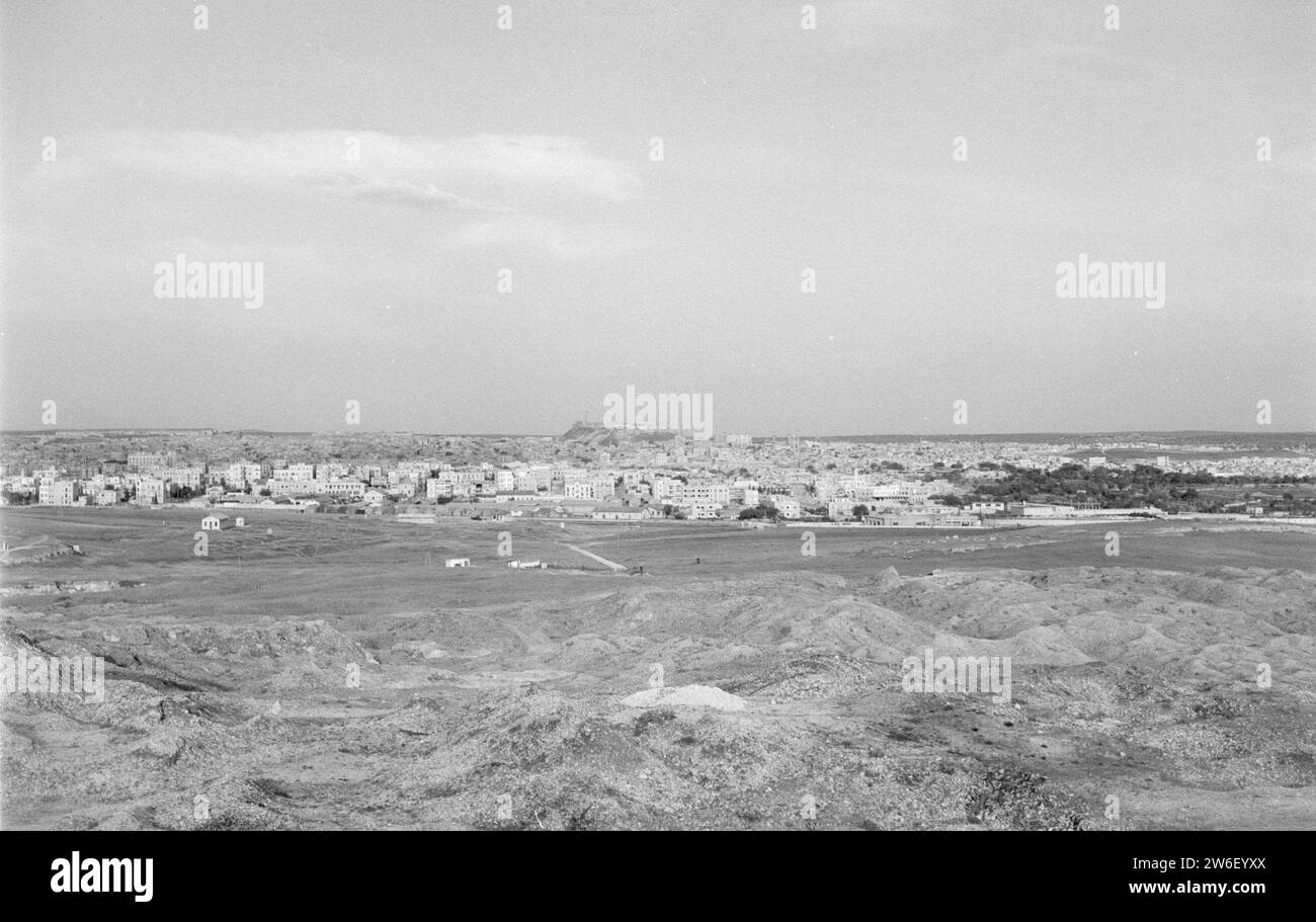 View of the city of Aleppo with the citadel above ca. 1950-1955 Stock ...