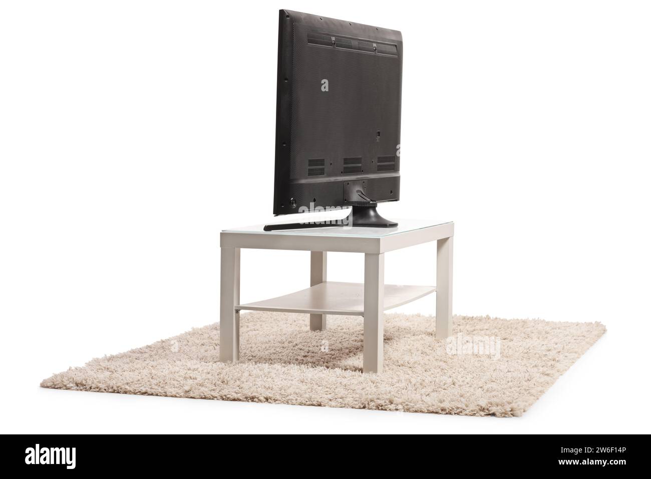 Rear view shot of a tv on a white table isolated on white background ...