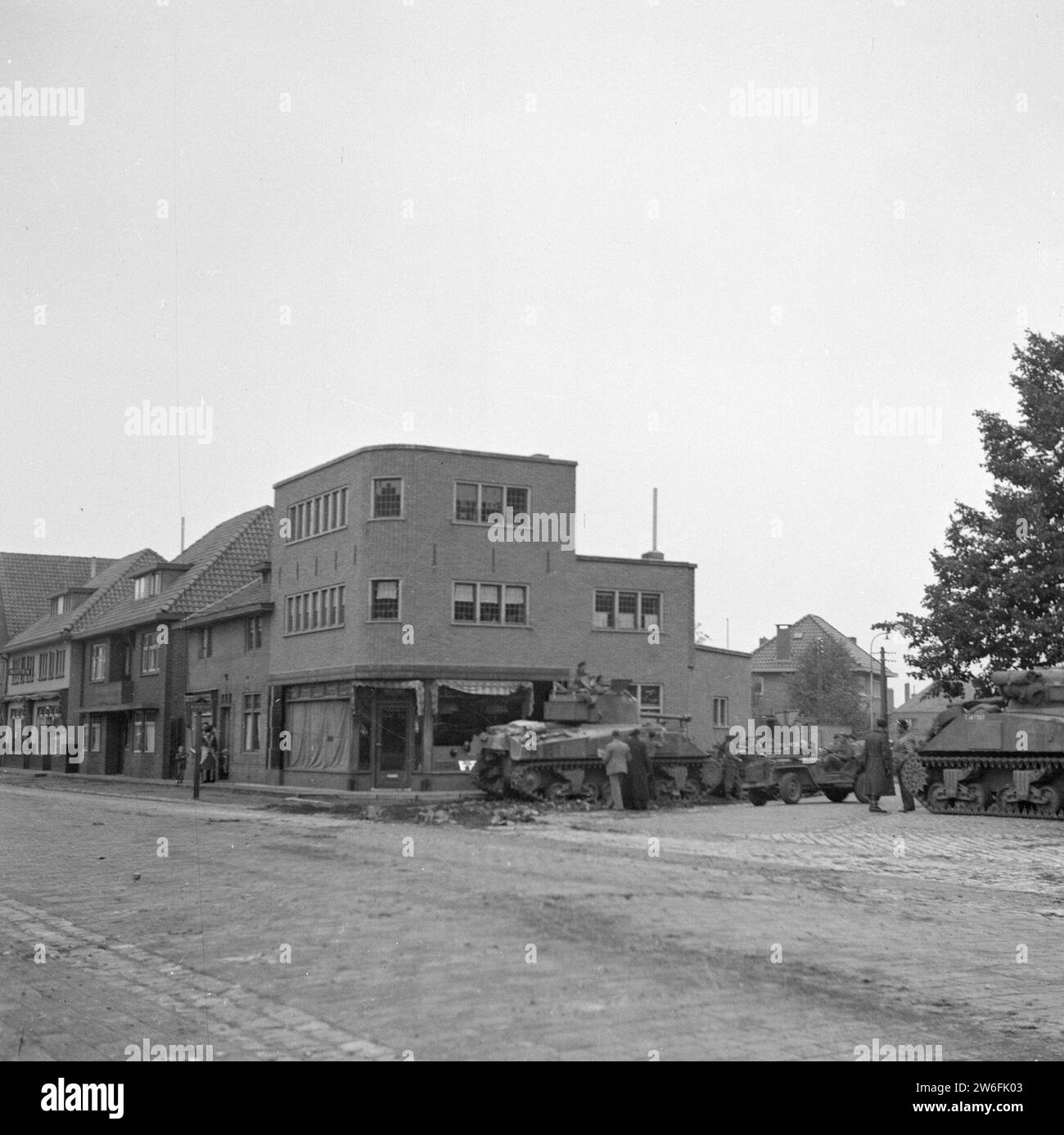(original caption) Irish Guards tank units take position at a junction ...