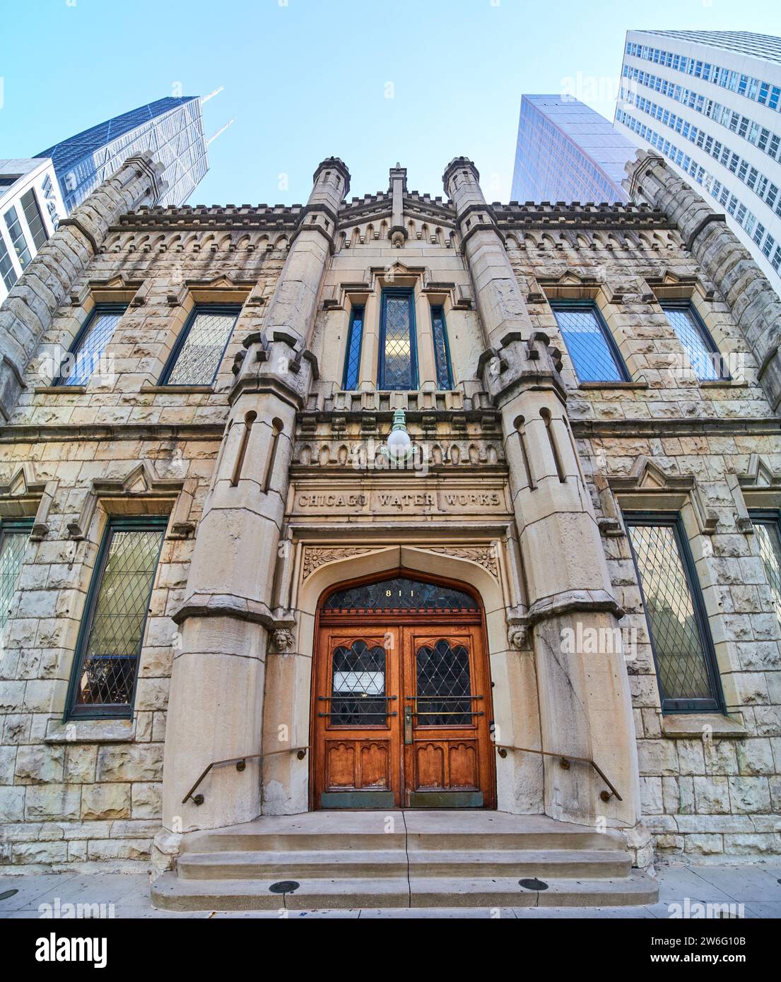 Chicago Water Works Building Against Modern Skyline, Upward View Stock ...