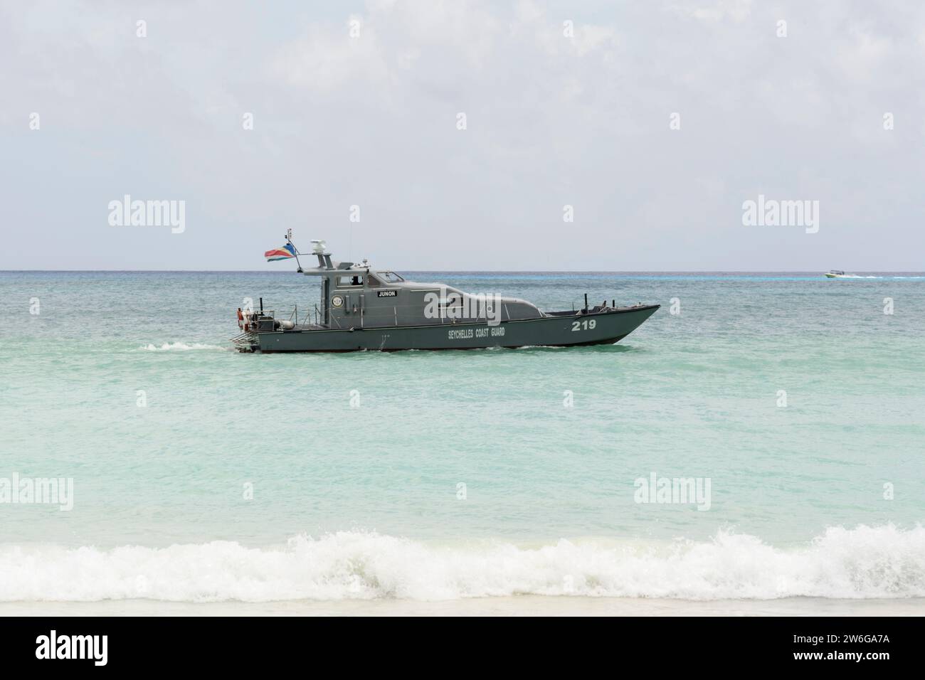 Seychelles coast guard boat patrolling the sea at Cote D'Or Beach, Anse ...