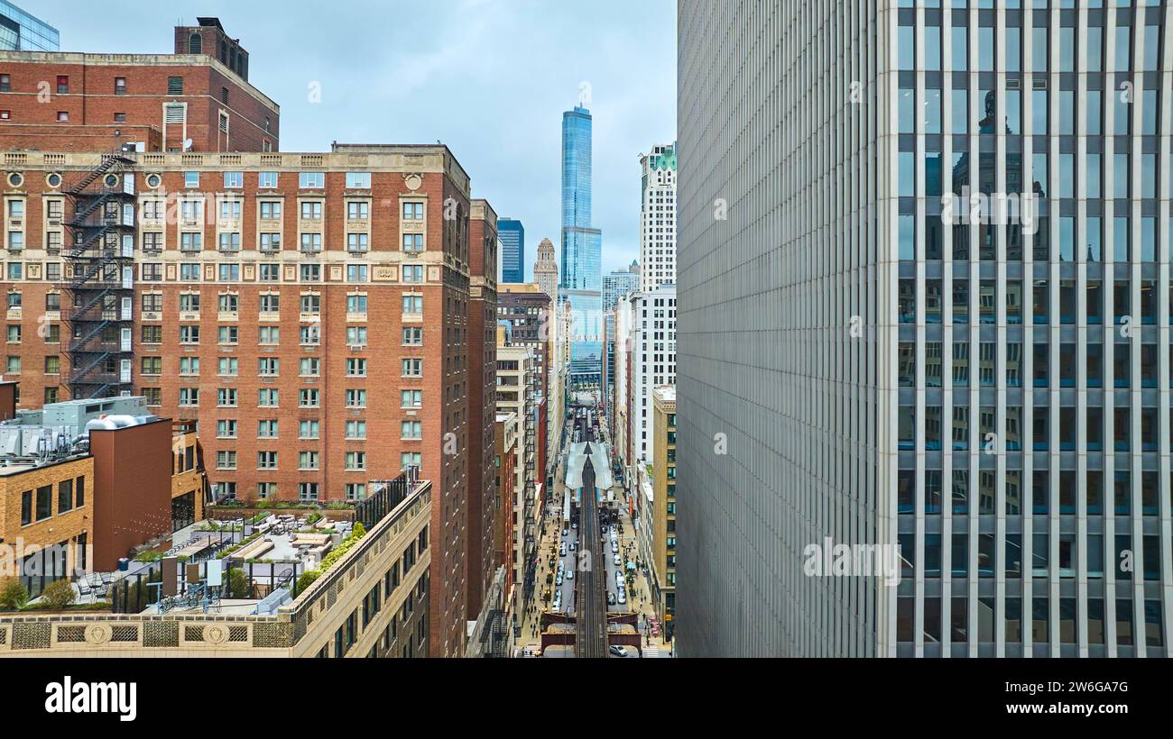 Aerial downtown skyscraper buildings, travel on railroad through big city tourism, Chicago IL ...