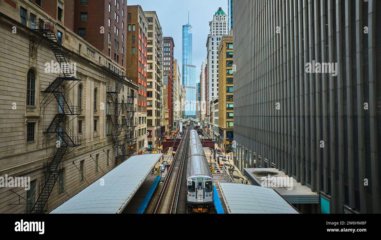 Train travel and tourism between downtown skyscraper buildings toward ...