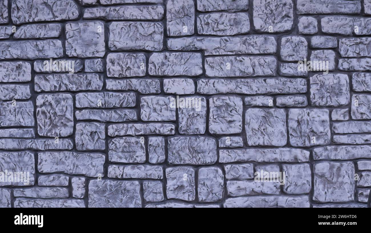 gray stonework background with rounded blocks of different sizes in a ...