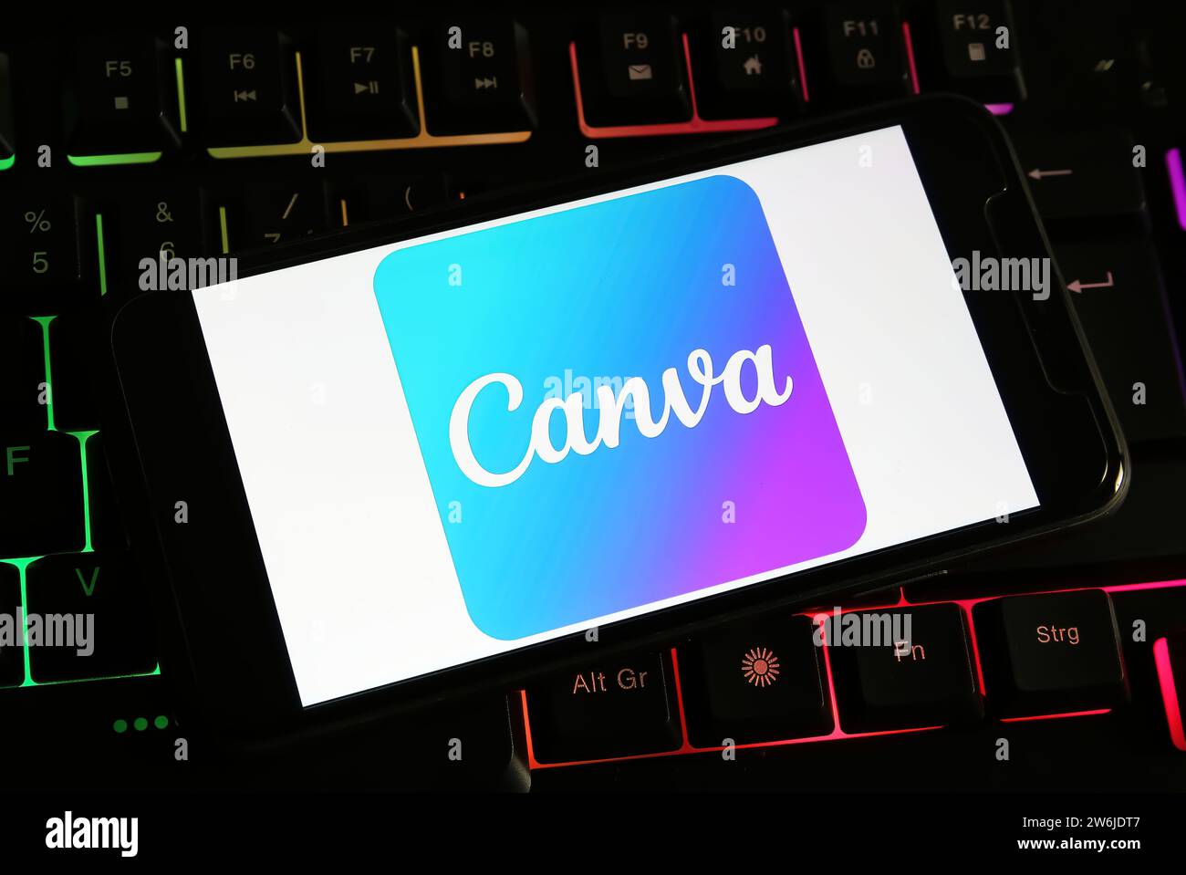 Viersen, Germany - December 9. 2023: Closeup of smartphone on computer ...