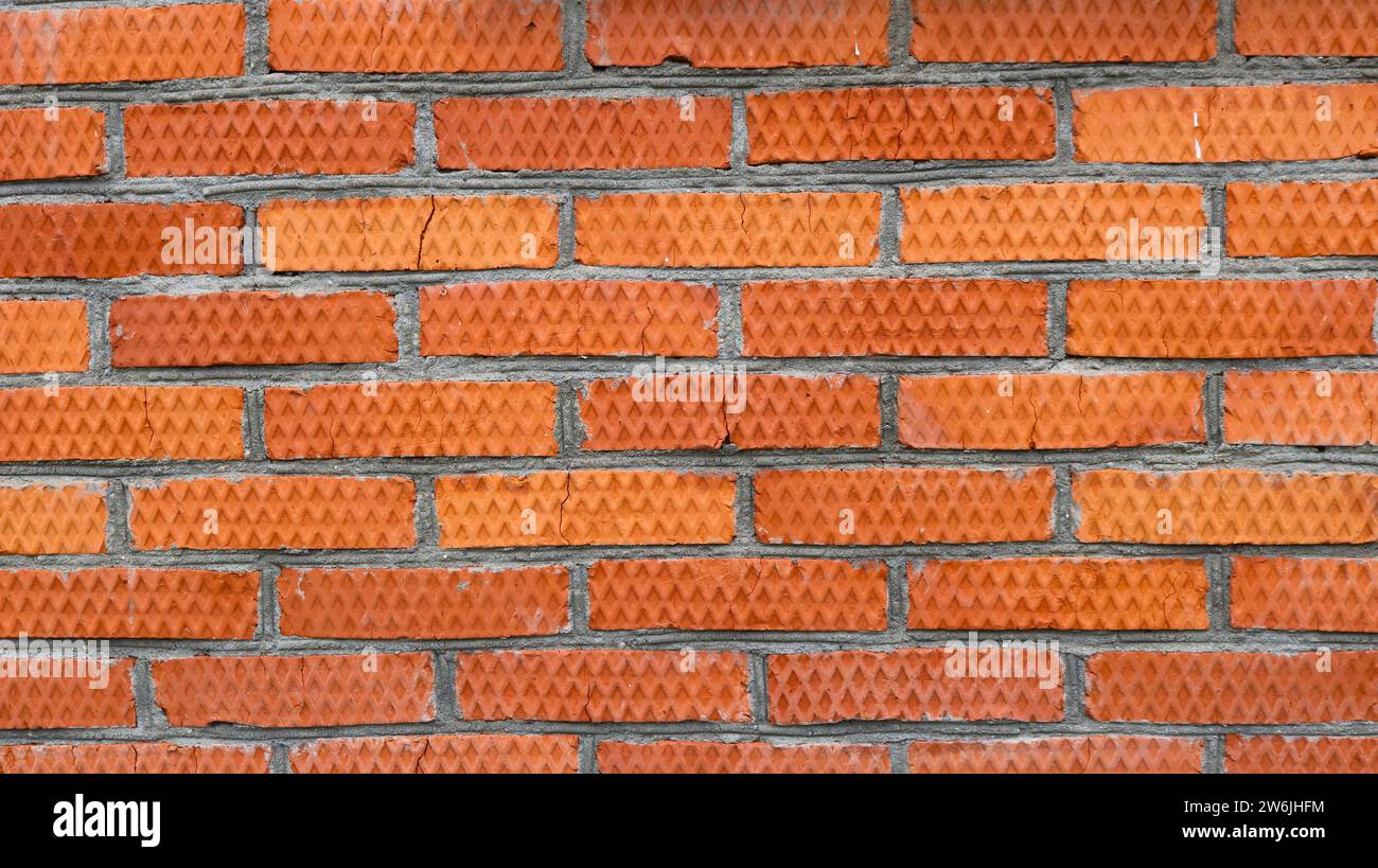 brickwork of textured ribbed finishing bricks close-up, background ...