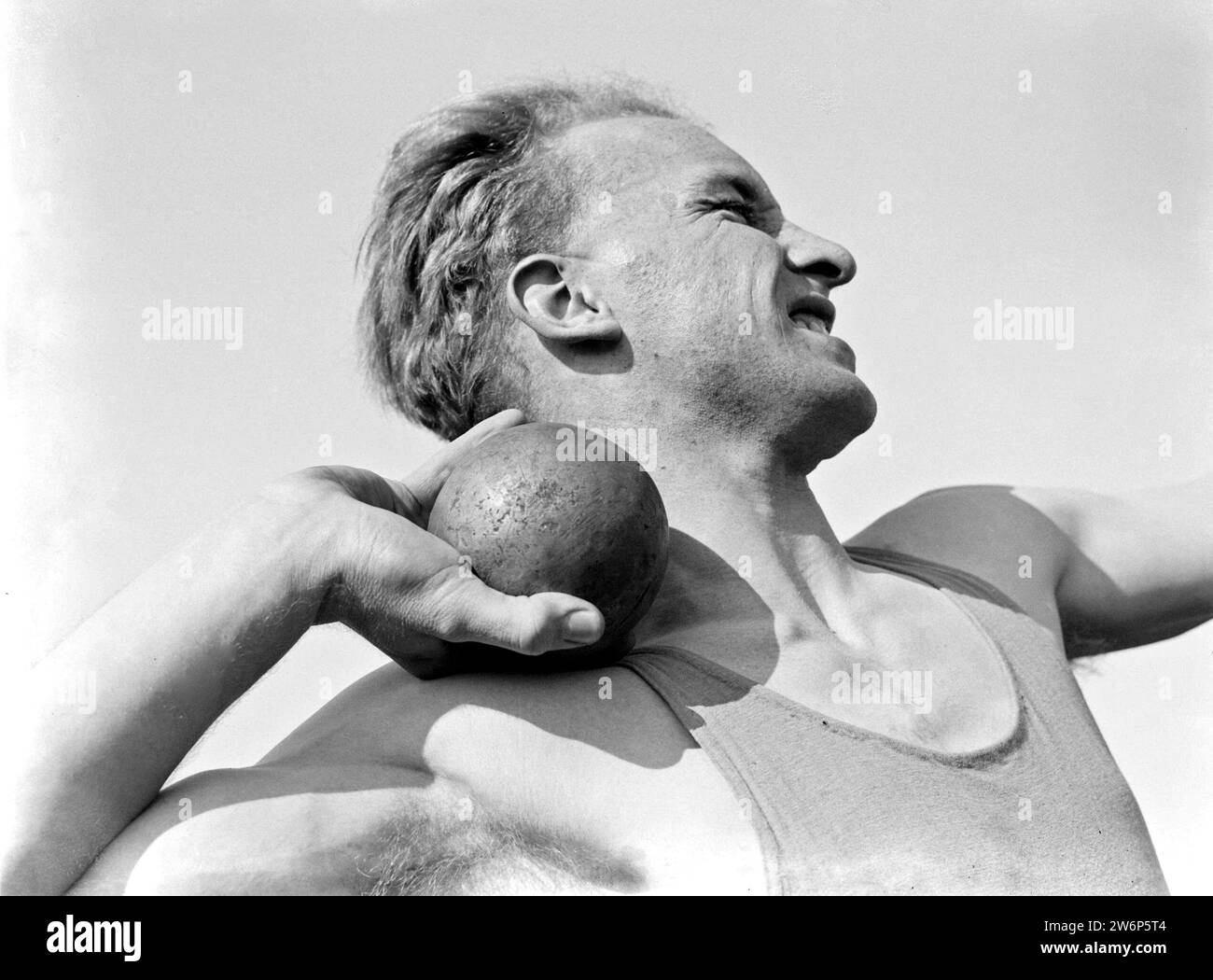 Shot putter in action ca. 1933 Stock Photo - Alamy