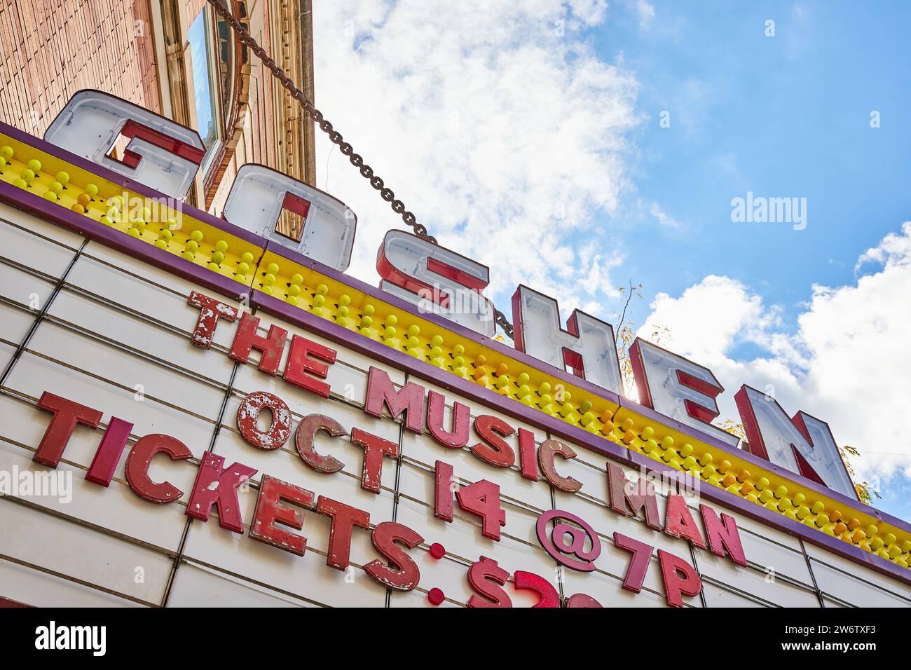 Goshen theater sign under blue sky with white clouds on bright, sunny ...