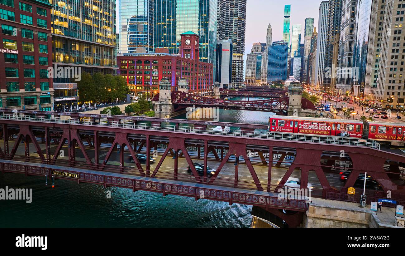 Chicago bridges over canal aerial with city lights and skyscraper buildings in downtown, tourism ...