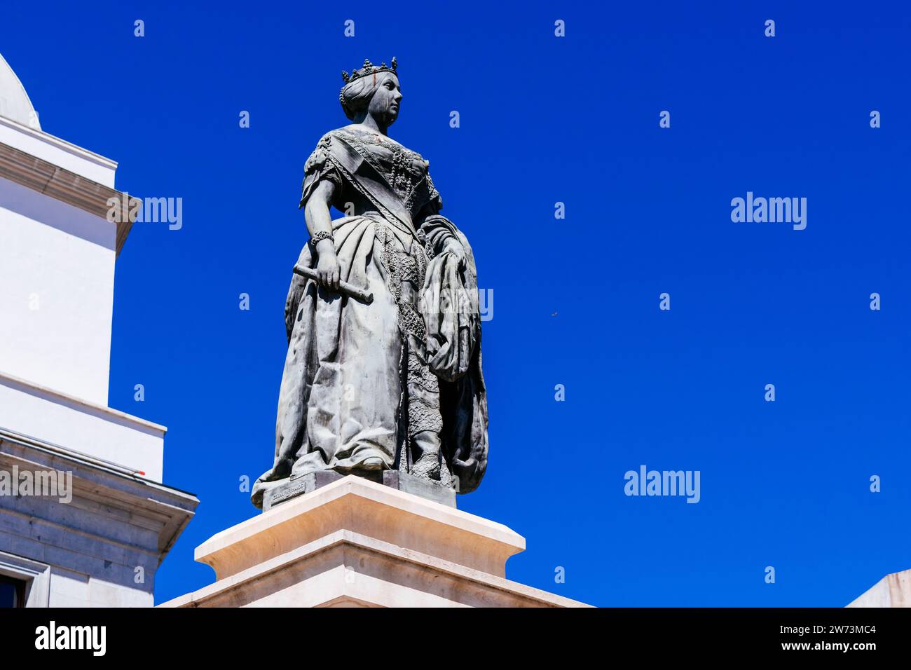 Statue of Isabel II, located in the Plaza de Ópera, in front of the ...