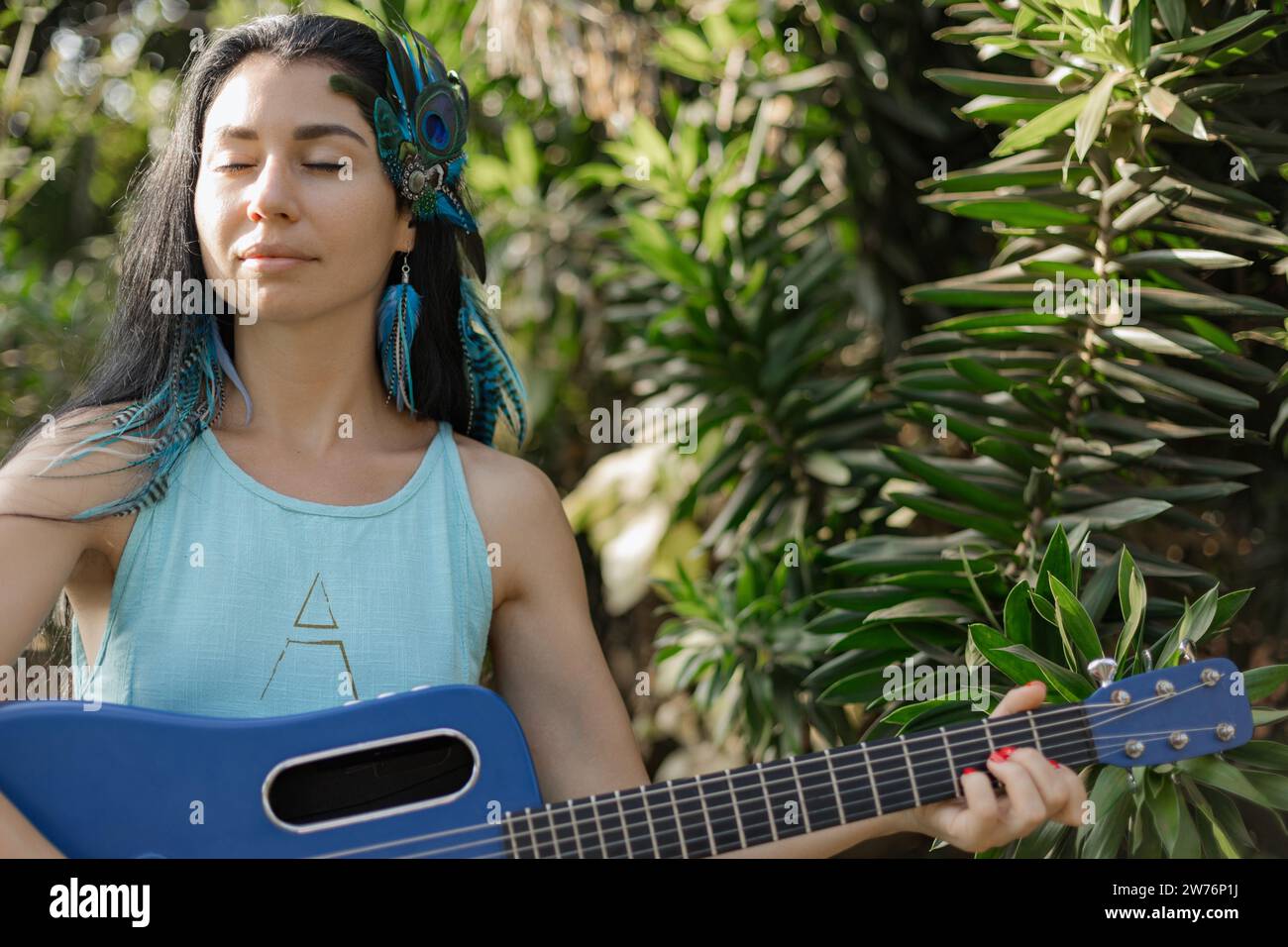 Pretty woman, singer, closed her eyes completely immersed in music ...