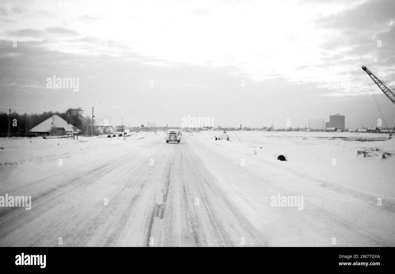Cars driving on the roads in Amsterdam that have been transformed into ...