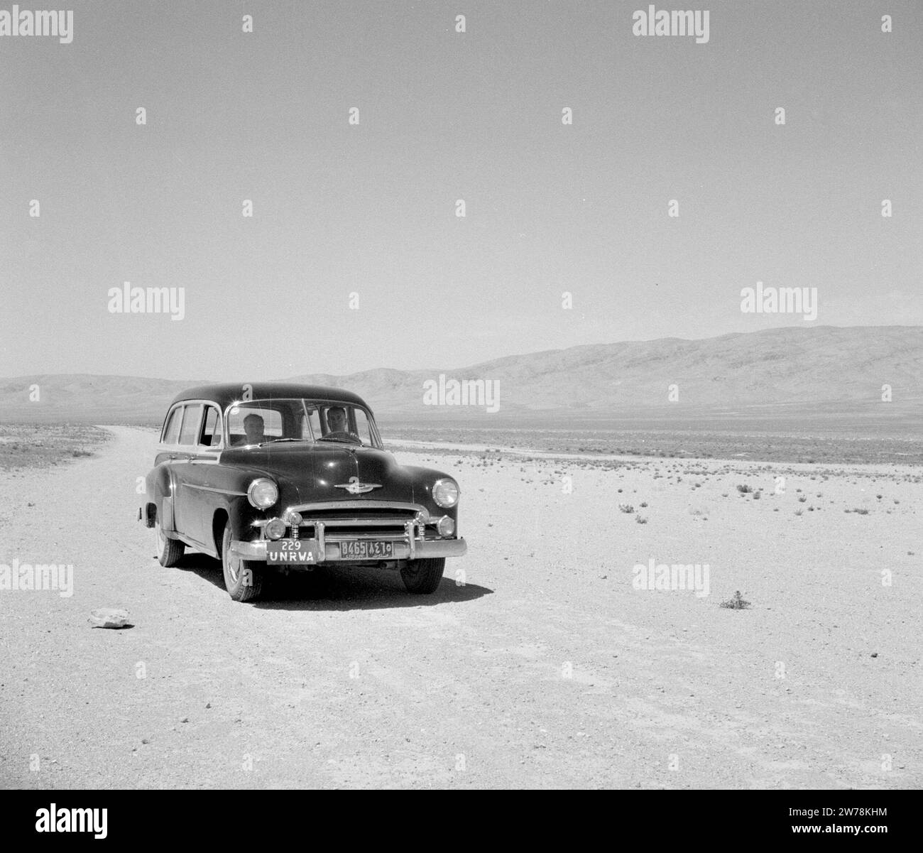 Car driving in the desert on the road from Malula to Damascus ca. 1950 ...