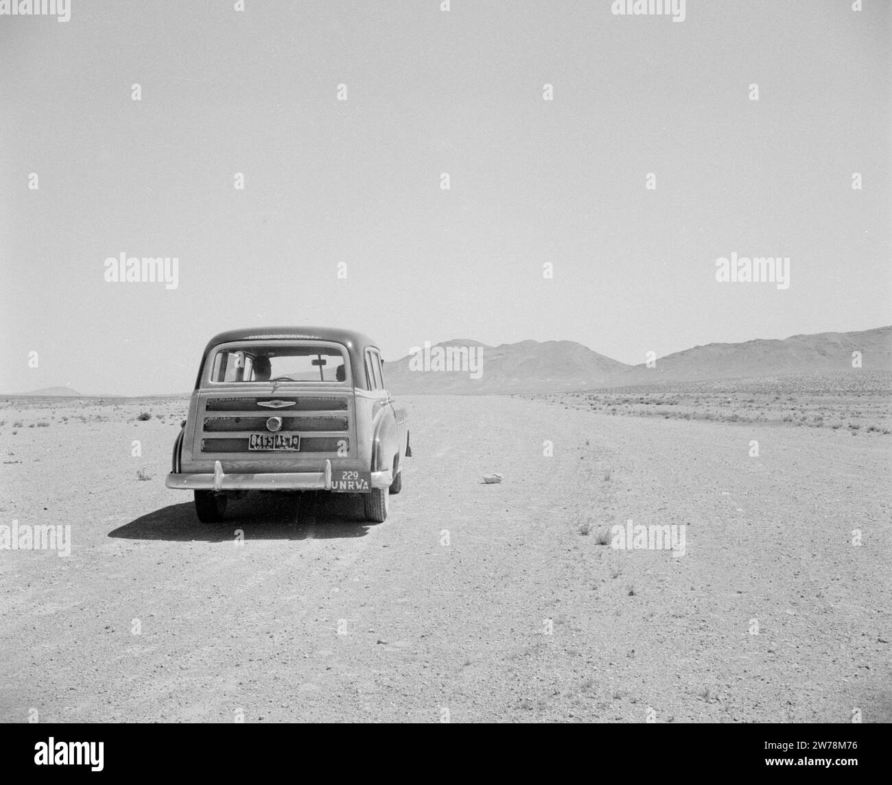 Car driving in the desert on the road from Malula to Damascus ca. 1950 ...