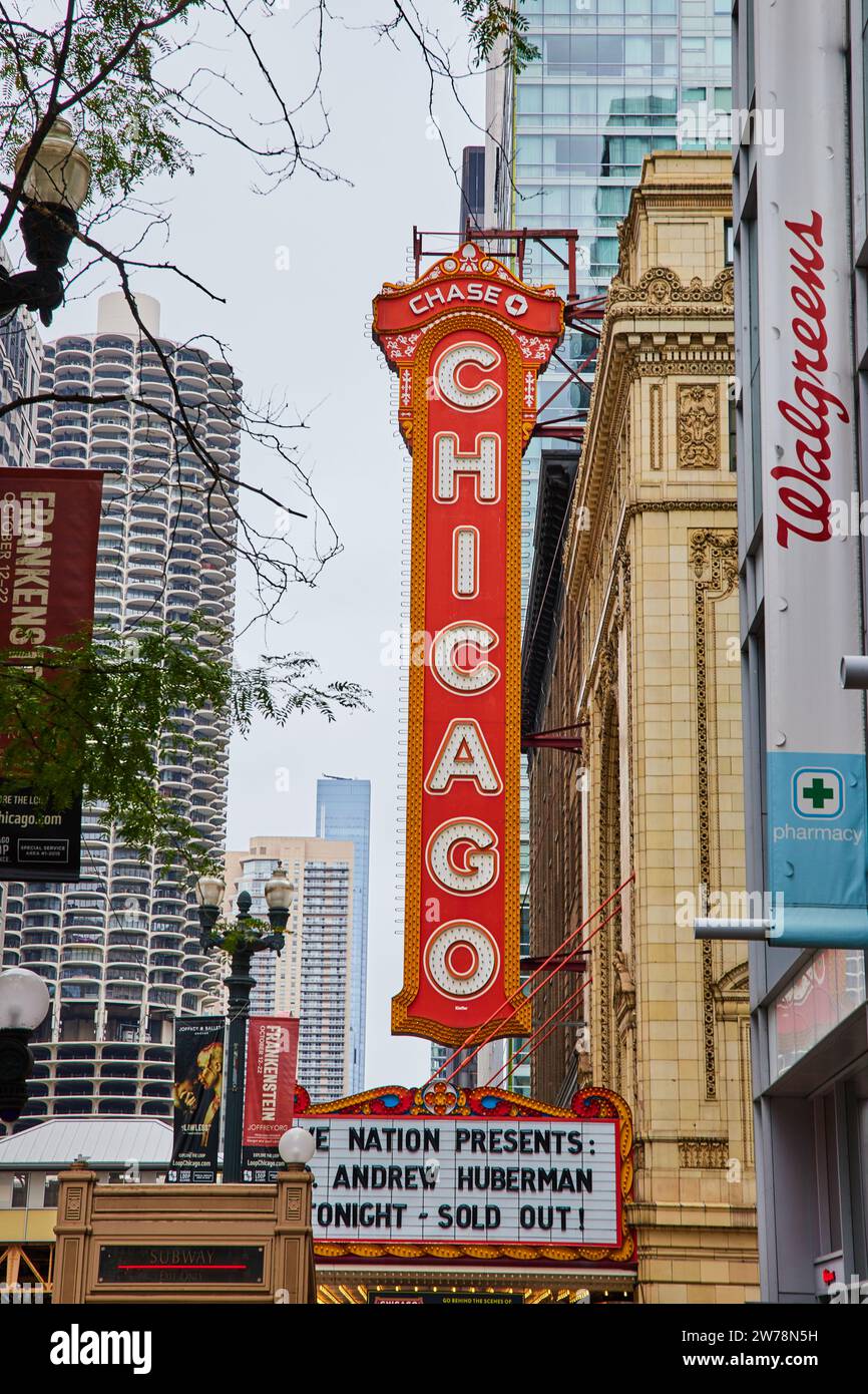 Large orange and yellow Chicago sign with white lettering above a ...