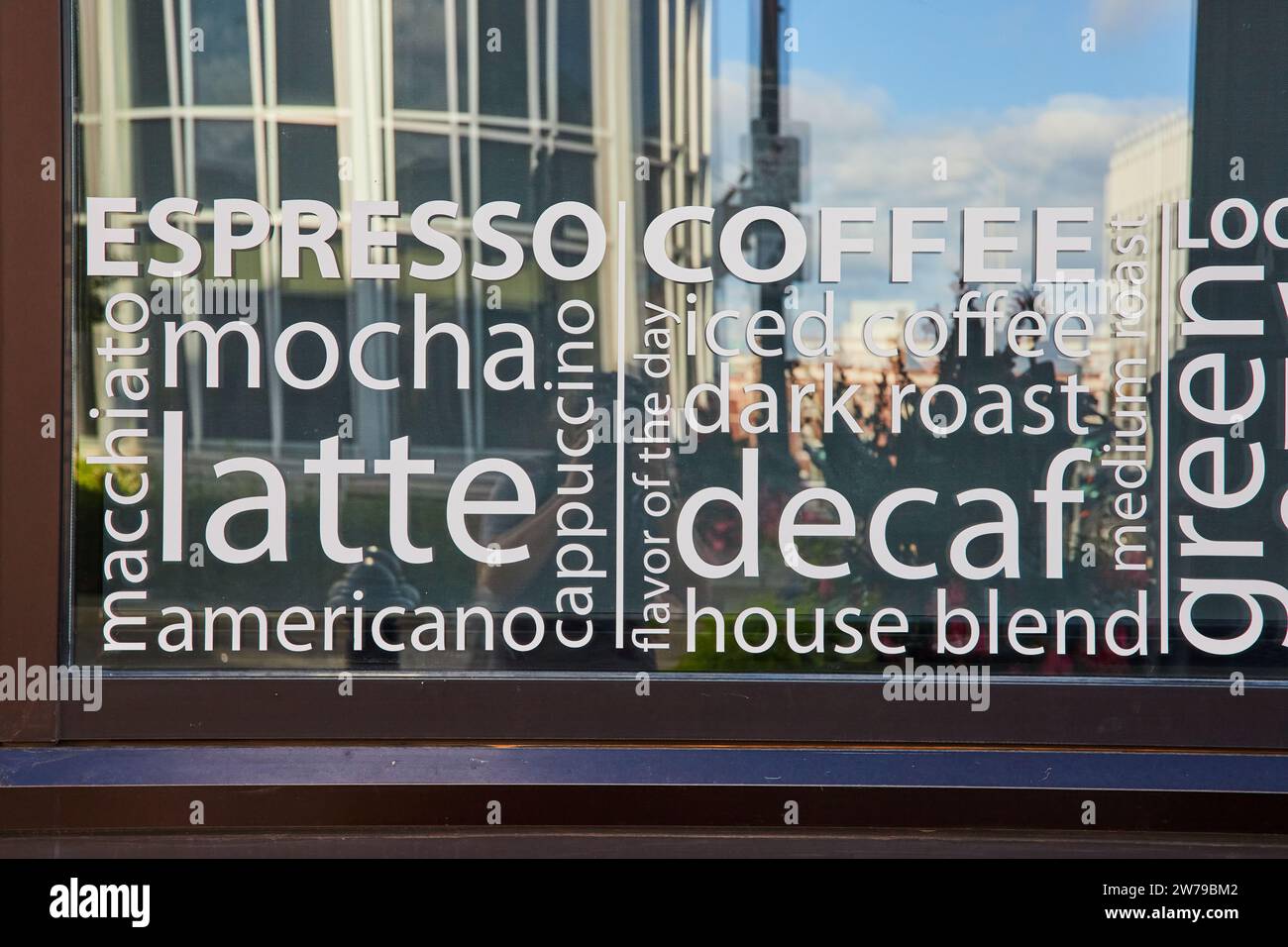 Urban Coffee Shop Menu Window with City Reflections Stock Photo - Alamy