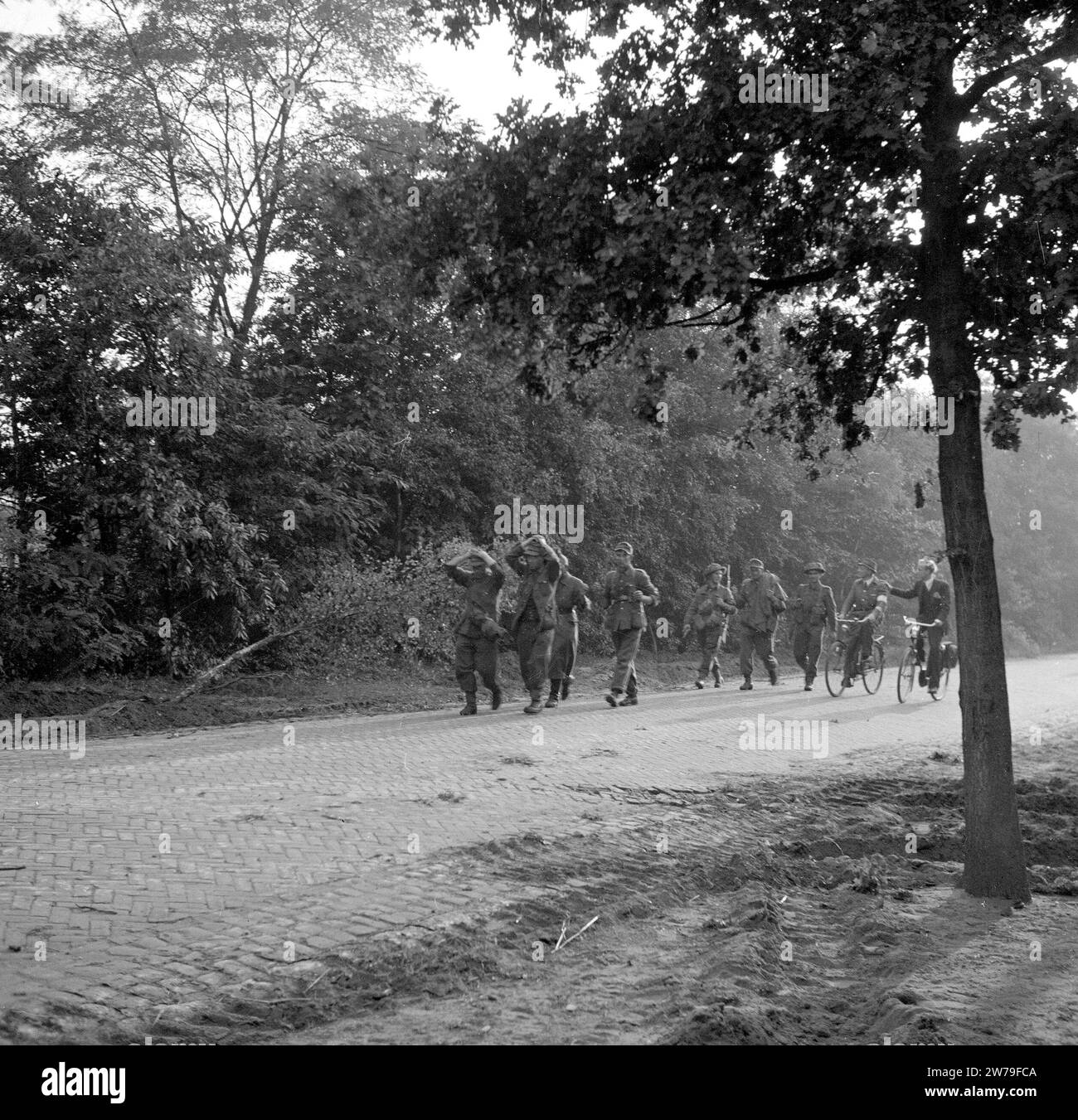 German soldiers are taken prisoner, presumably by Irish Guards during ...