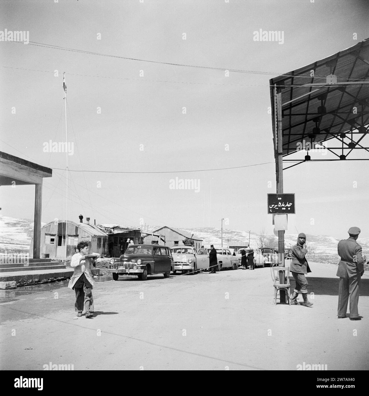 Cars and customs officers at the Syria-Lebanon border post ca. 1950 ...