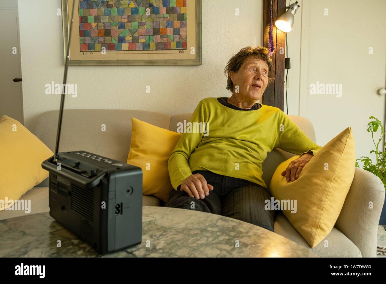 11.10.2023, Germany, Bremen, Bremen - Retired radio editor listening to ...