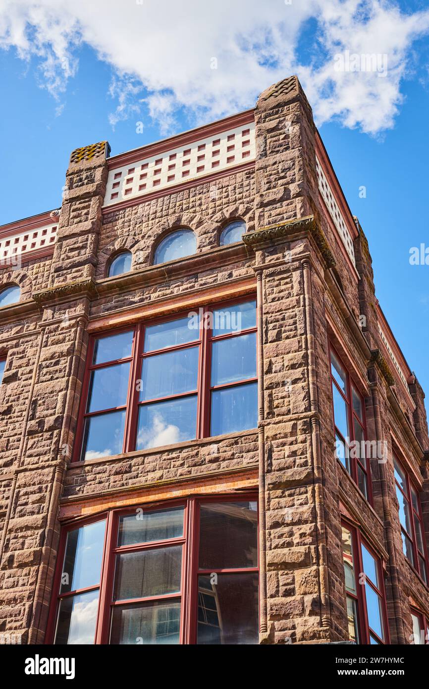 Sandstone Building Elegance with Arched Windows, Sunny Sky - Upward ...