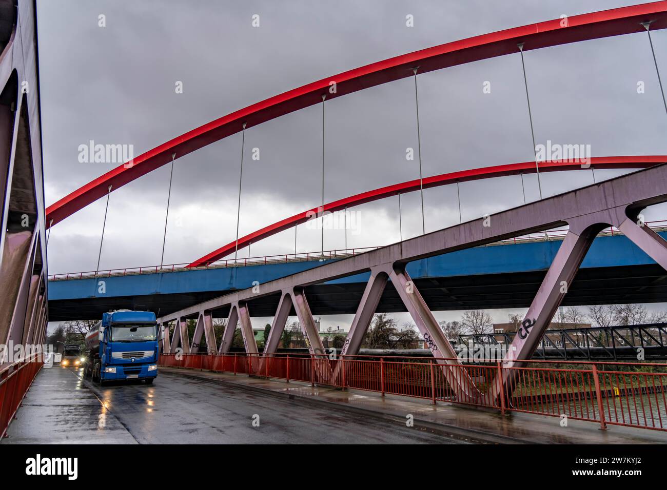 A42 motorway bridge, (red arches) over the Rhine-Herne Canal, with ...