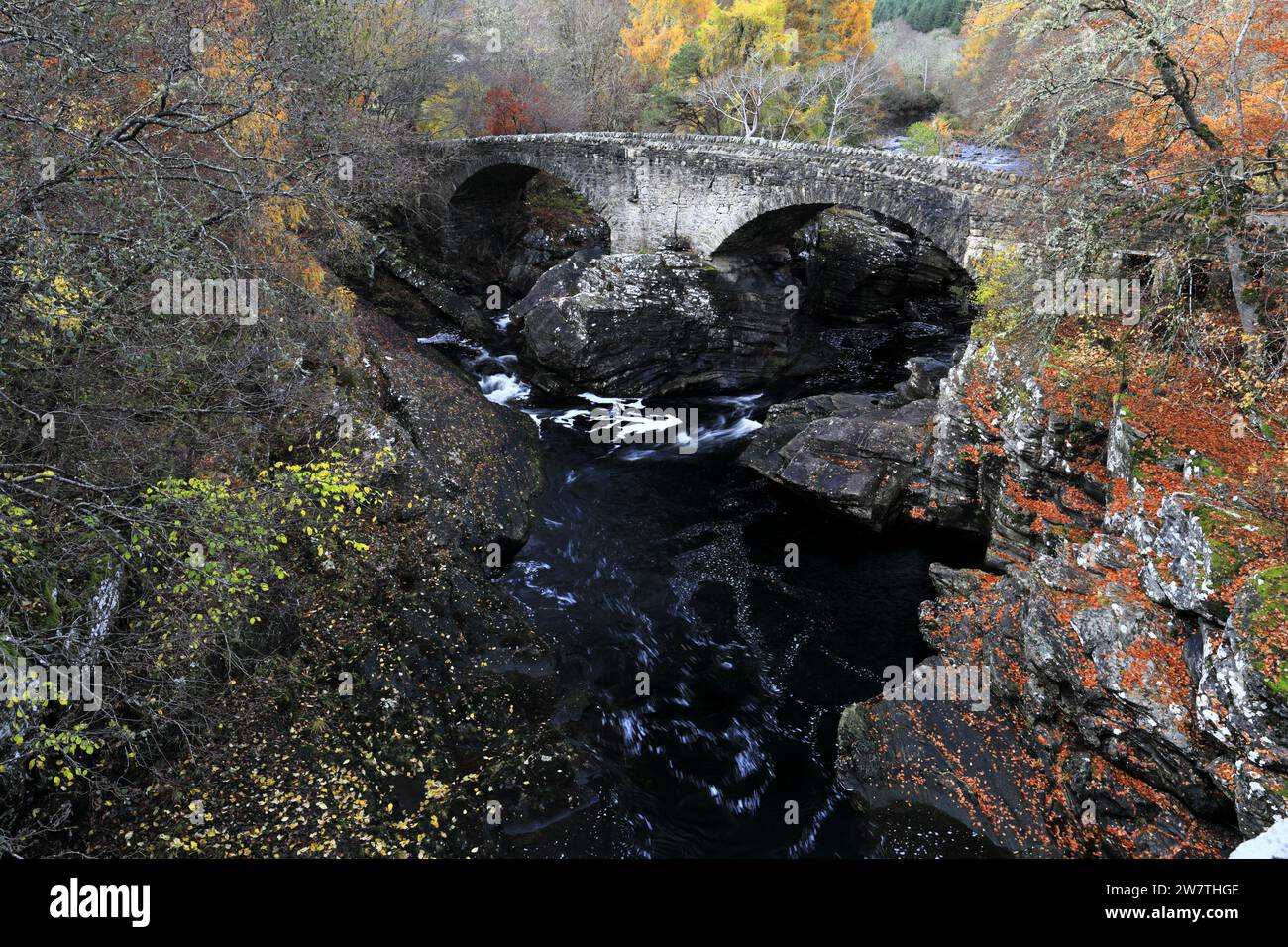 Autumn colours, the river Moriston falls, Invermoriston town, Highlands ...