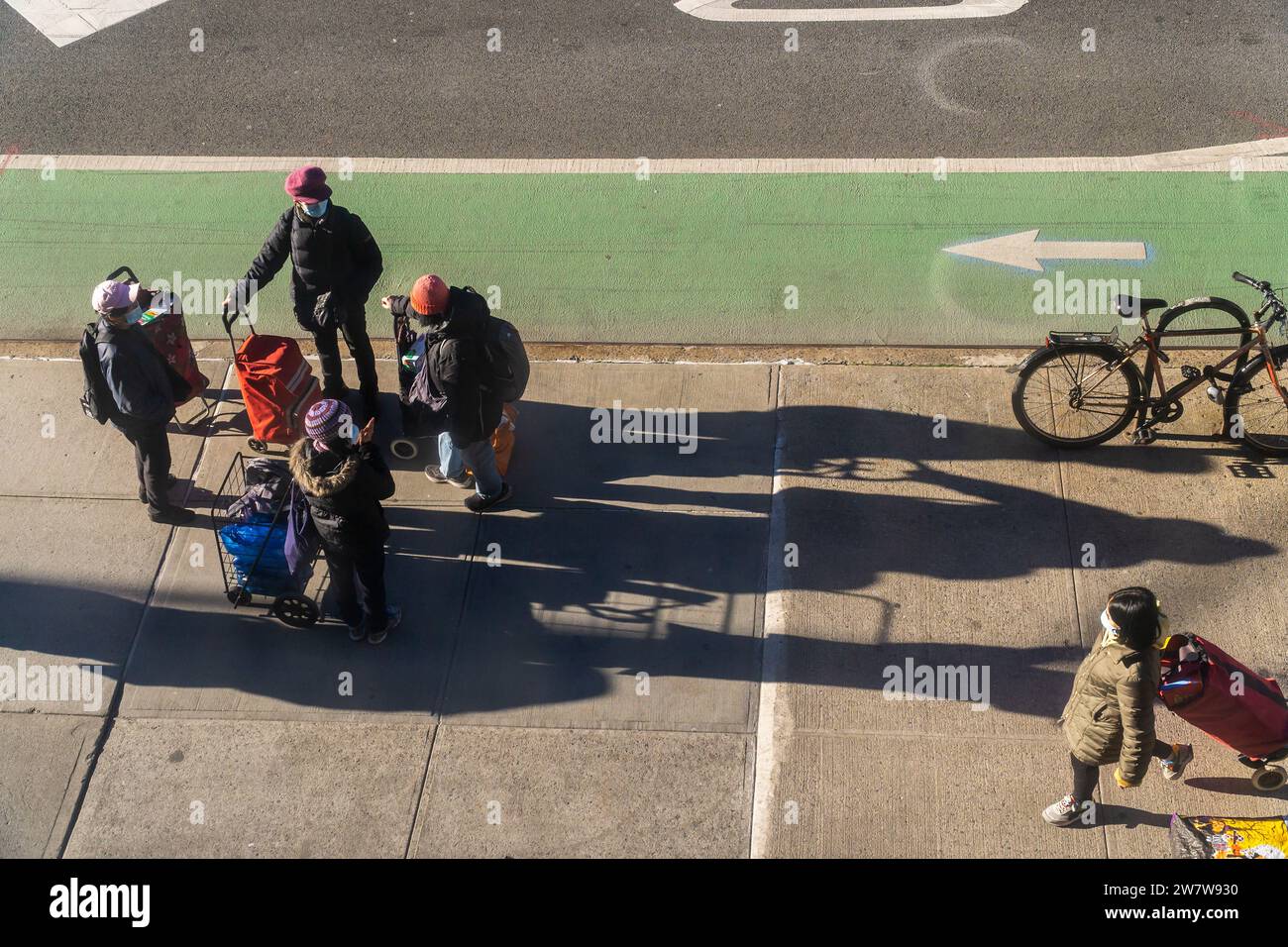 Clients outside the Holy Apostles Church food pantry after receiving ...