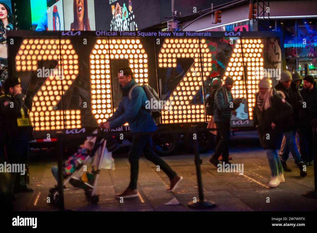Visitors to Times Square in New York flock to the temporary display of ...