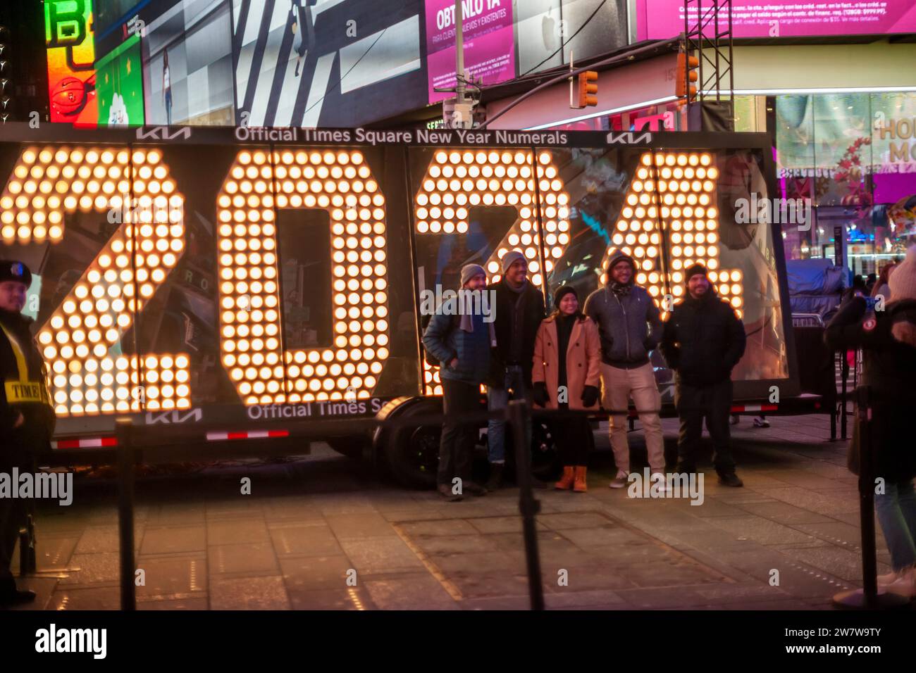 Visitors to Times Square in New York flock to the temporary display of ...