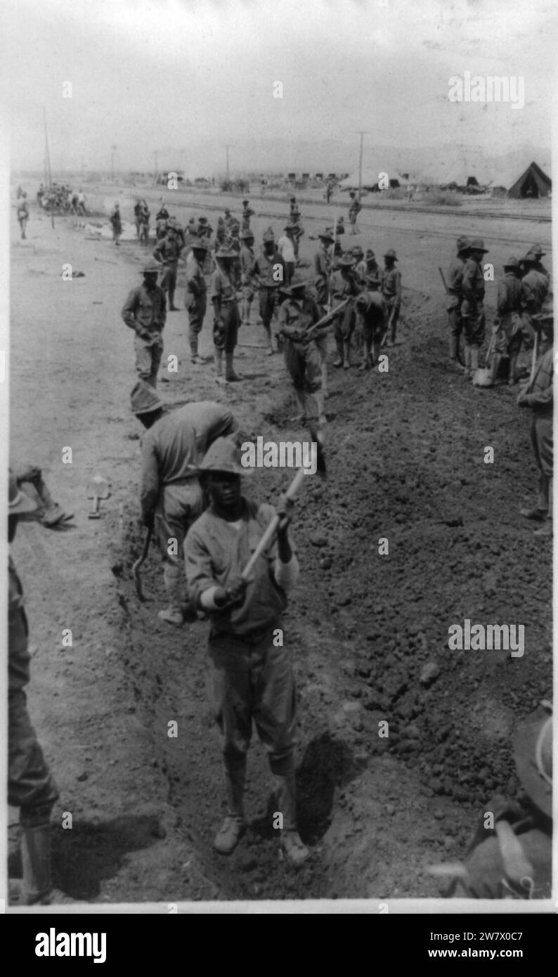 With the U.S. troops in Mexico-black soldiers digging a ditch for rain ...