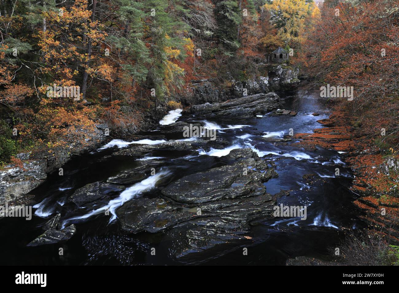 Autumn colours, the river Moriston falls, Invermoriston town, Highlands ...