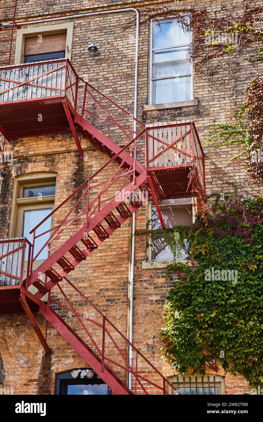 Rustic Brick Building with Fire Escape and Ivy, Urban Geometry ...