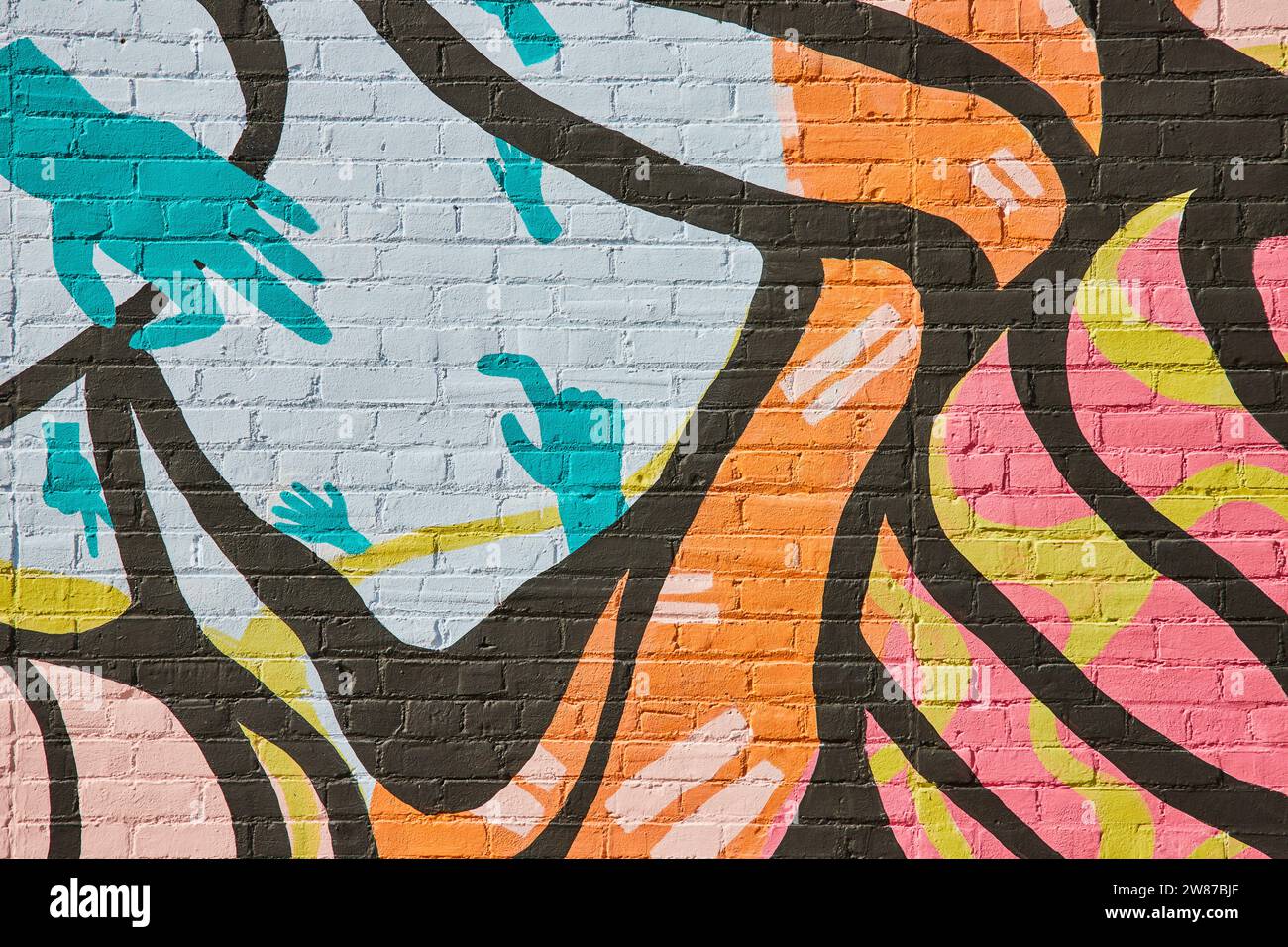 Colorful Abstract Hands Mural on Brick Wall, Urban Street Art Stock ...