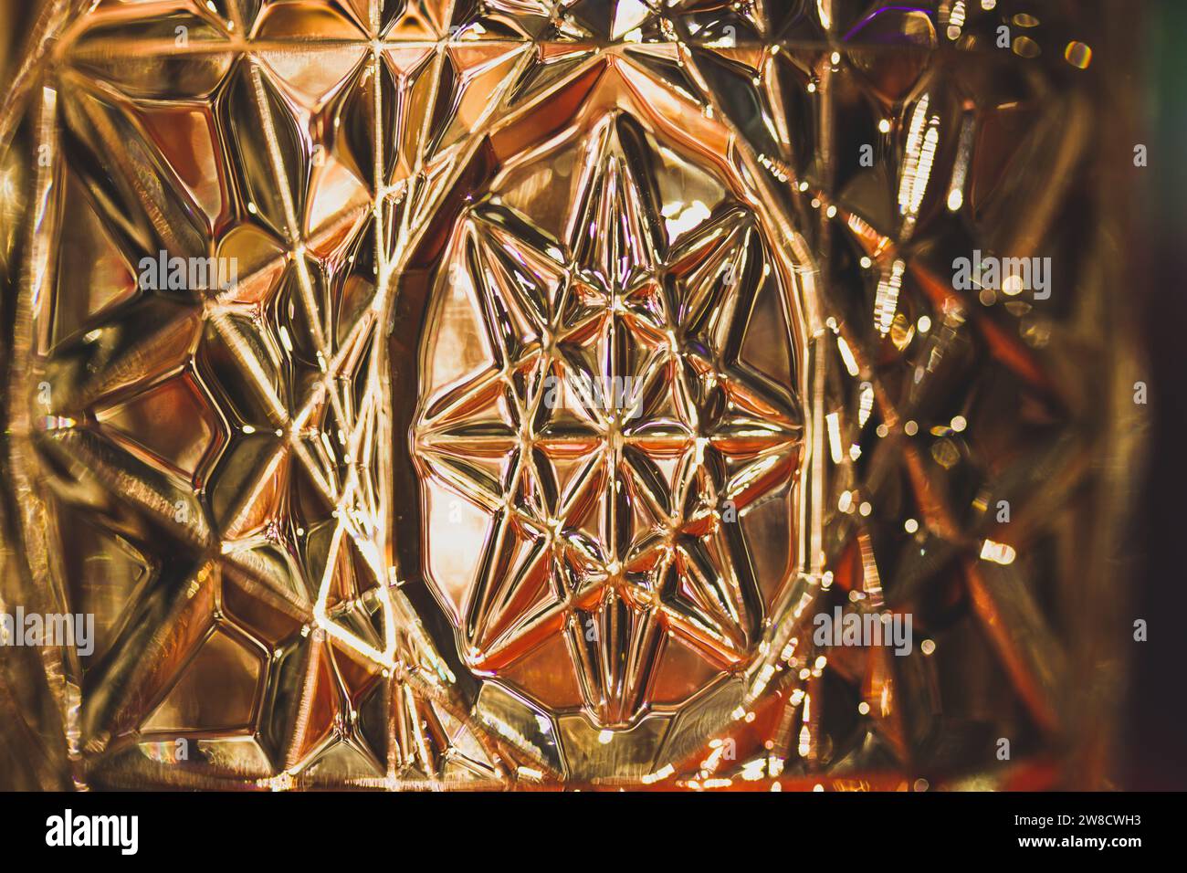 Lead diamond crystal in sunlight. Beautiful rippled glass. Glass vase ...