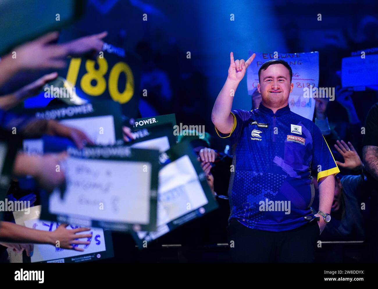 Luke Littler walks out to play Andrew Gilding (not pictured) on day ...