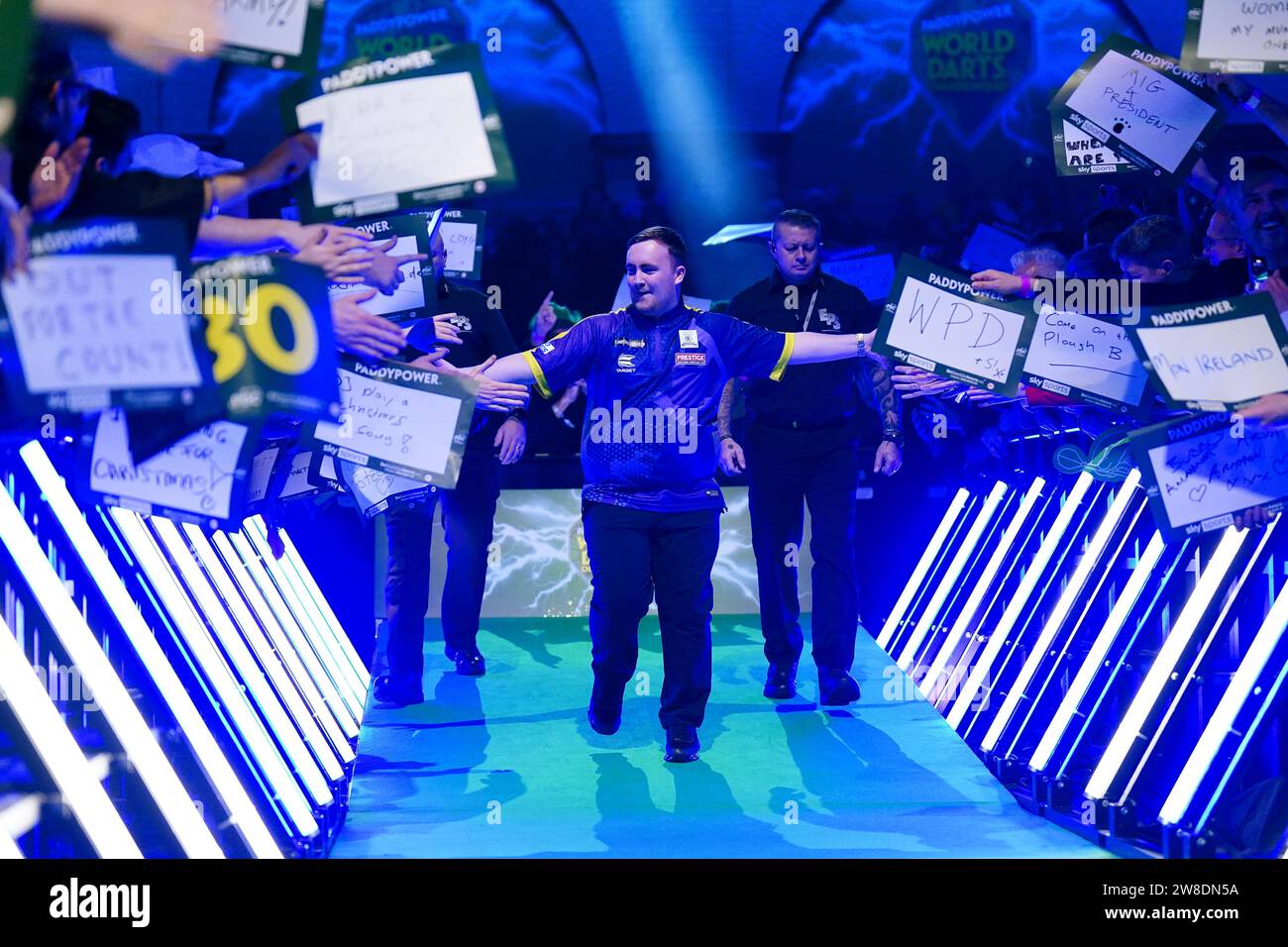 Luke Littler walks out to play Andrew Gilding (not pictured) on day ...